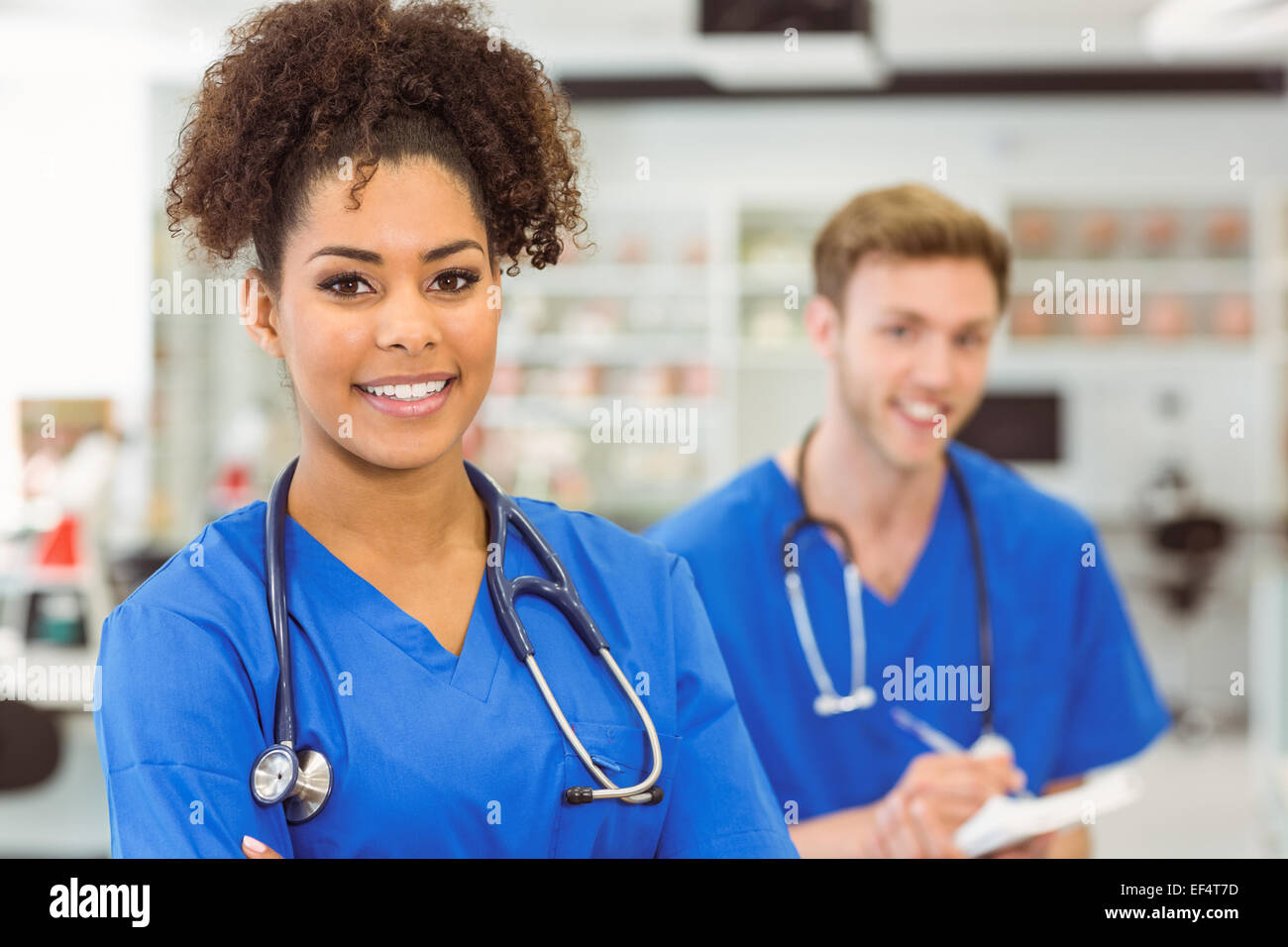 Young medical student smiling at the camera Stock Photo - Alamy