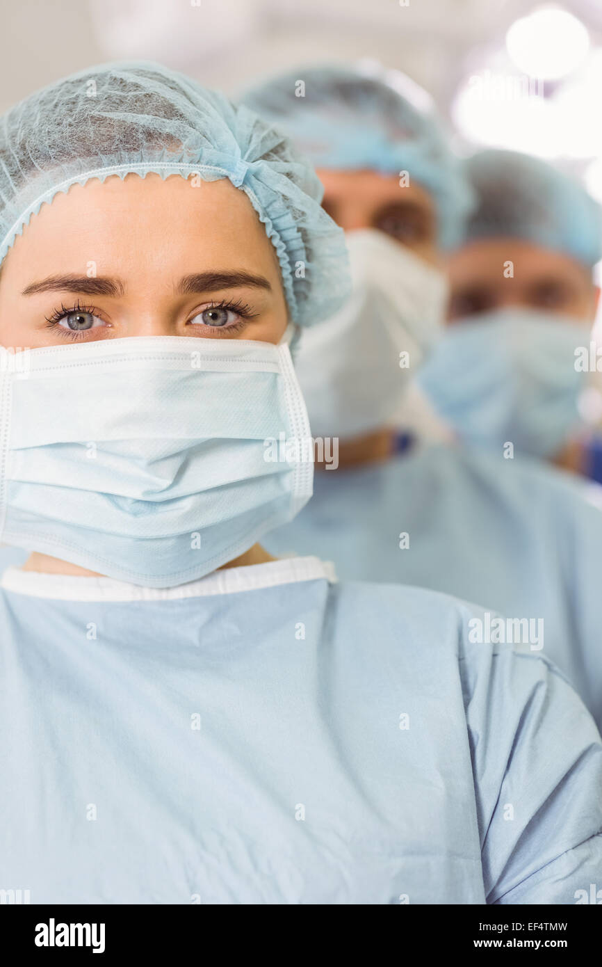 Team of surgeons looking at camera Stock Photo - Alamy
