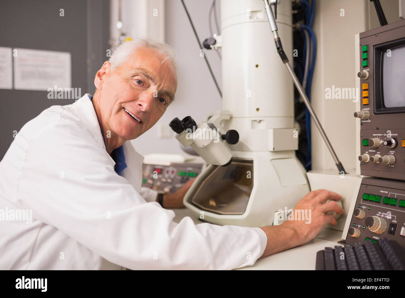 Microscope white coat smiling medical hi-res stock photography and ...