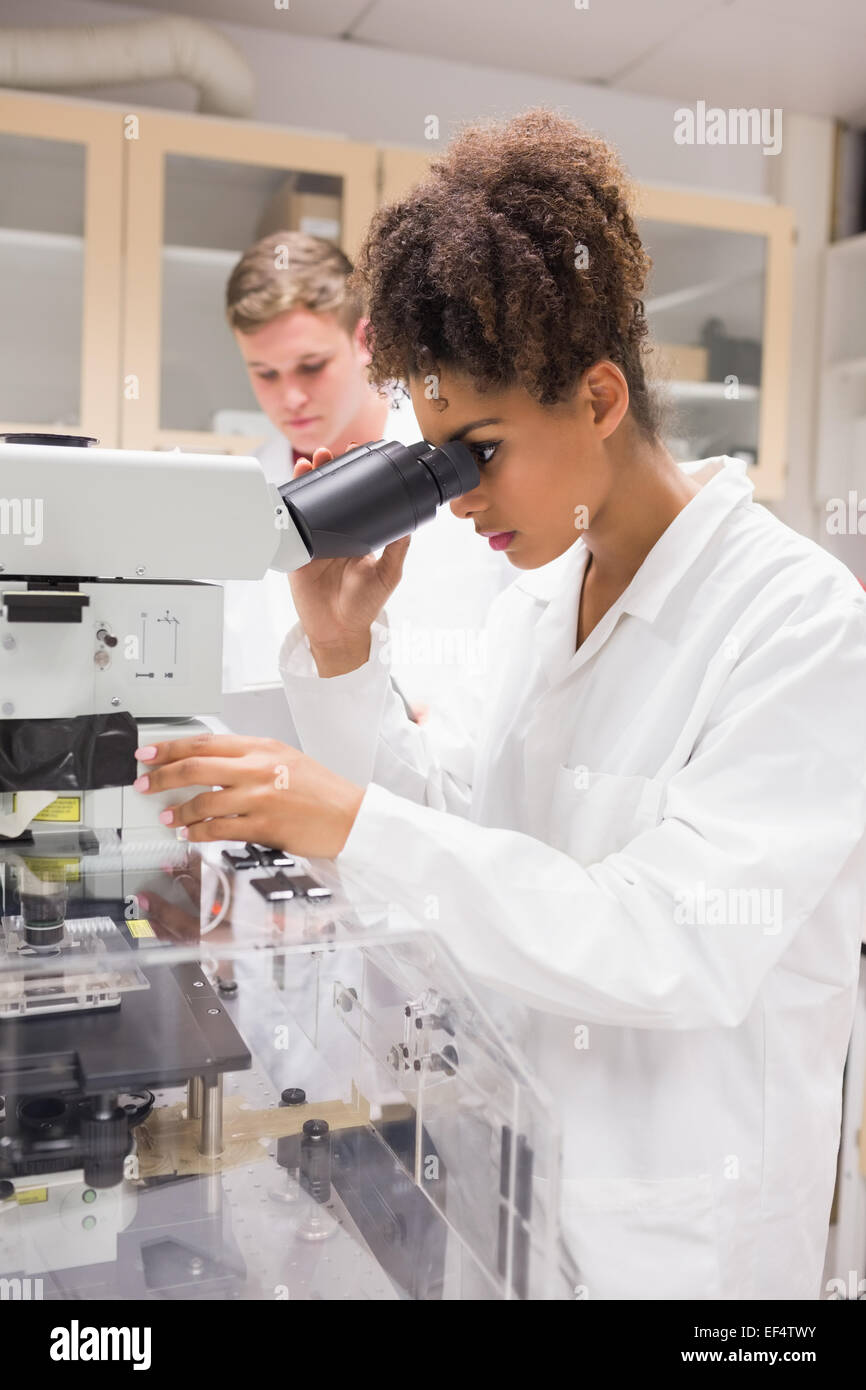 Student using microscope hi-res stock photography and images - Alamy