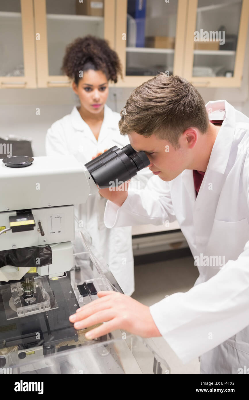 Attractive young scientist team hi-res stock photography and images - Alamy