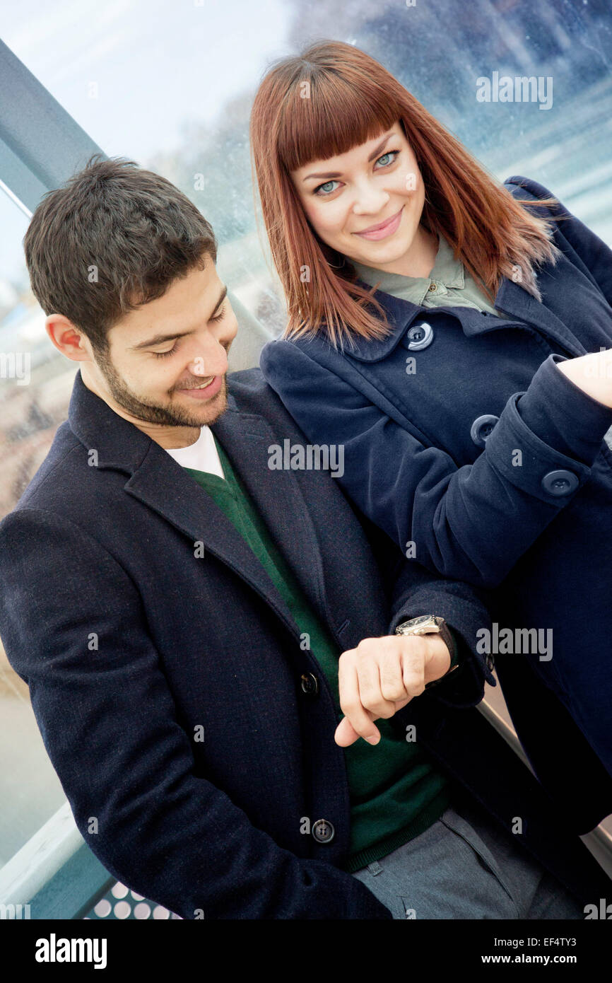 Checking the time hi-res stock photography and images - Alamy