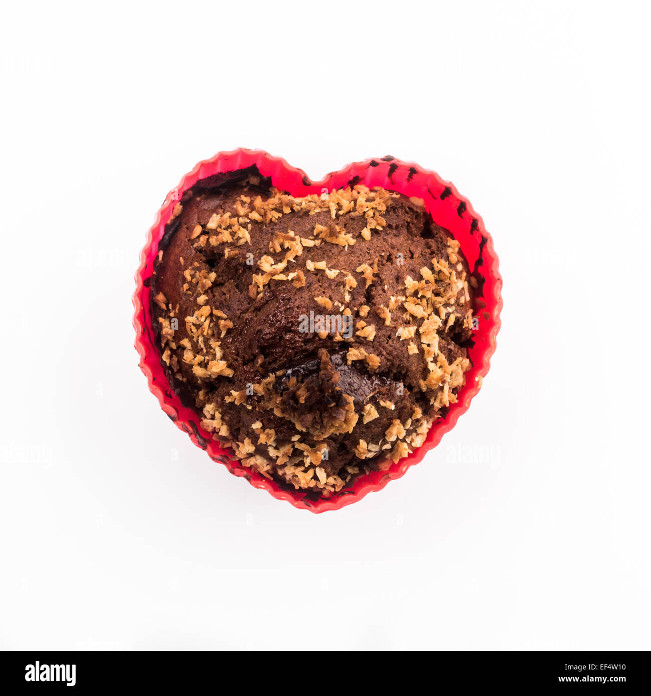 Sweet heart shape muffin in silicone mold Stock Photo - Alamy