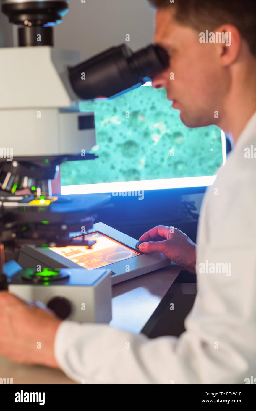 Student microscope sitting hi-res stock photography and images - Alamy