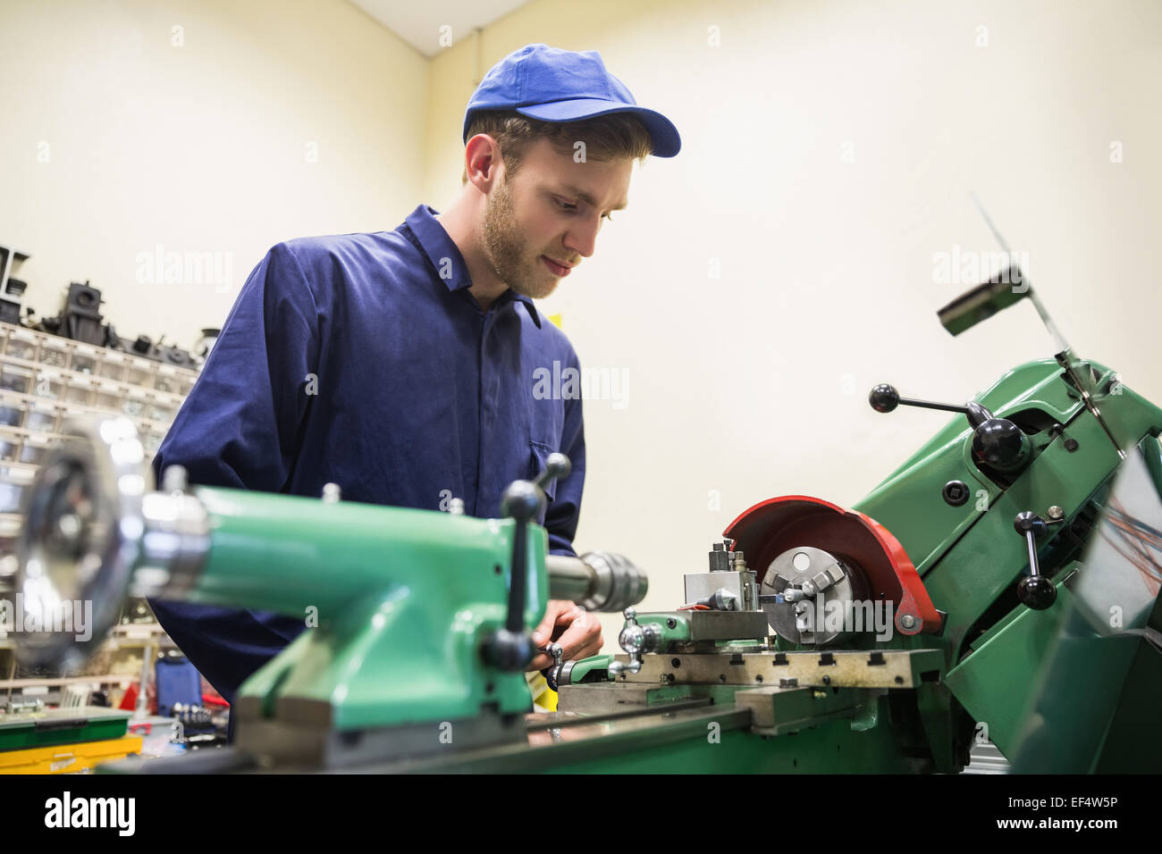 Engineering student using heavy machinery Stock Photo - Alamy