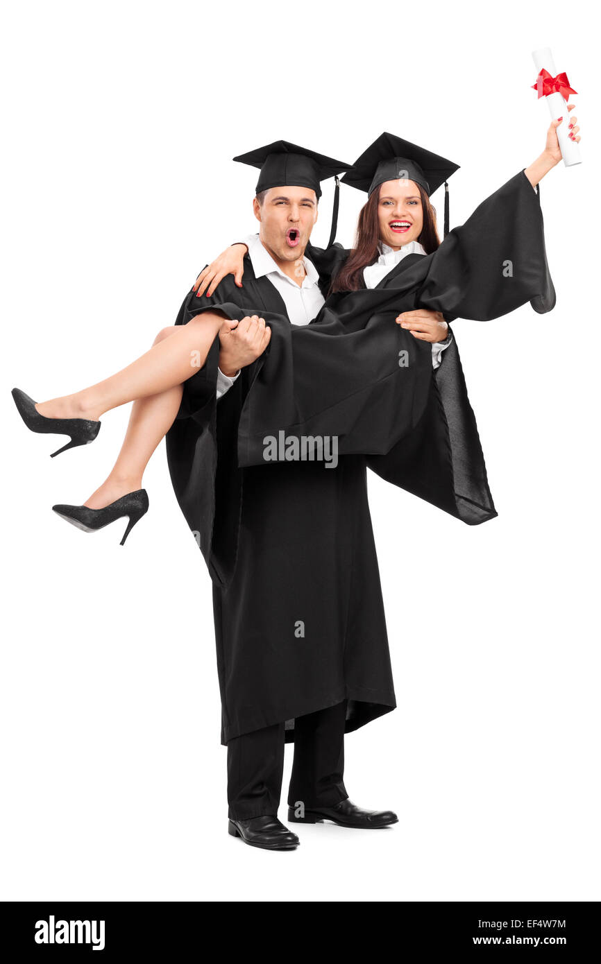 Full length portrait of a young couple celebrating their graduation ...