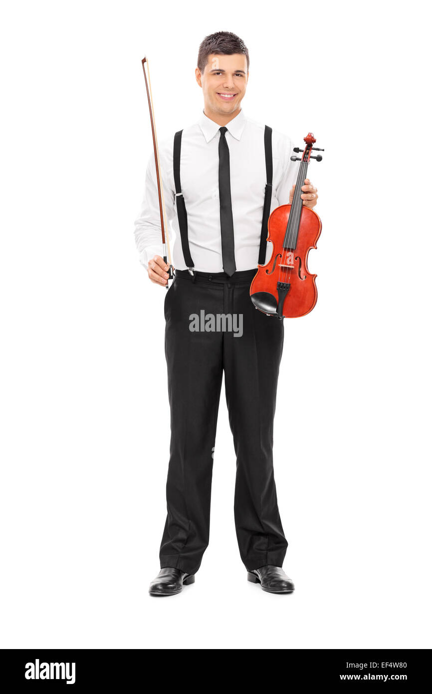 Full length portrait of a young male violinist posing isolated on white ...