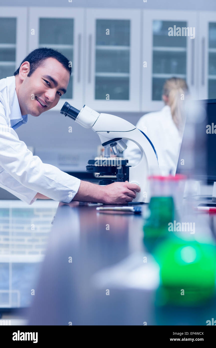 Science student working with microscope in the lab Stock Photo - Alamy