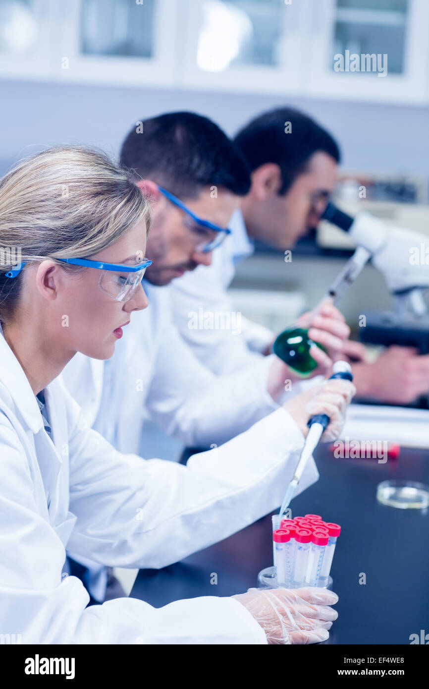 Science students working with chemicals in lab Stock Photo - Alamy