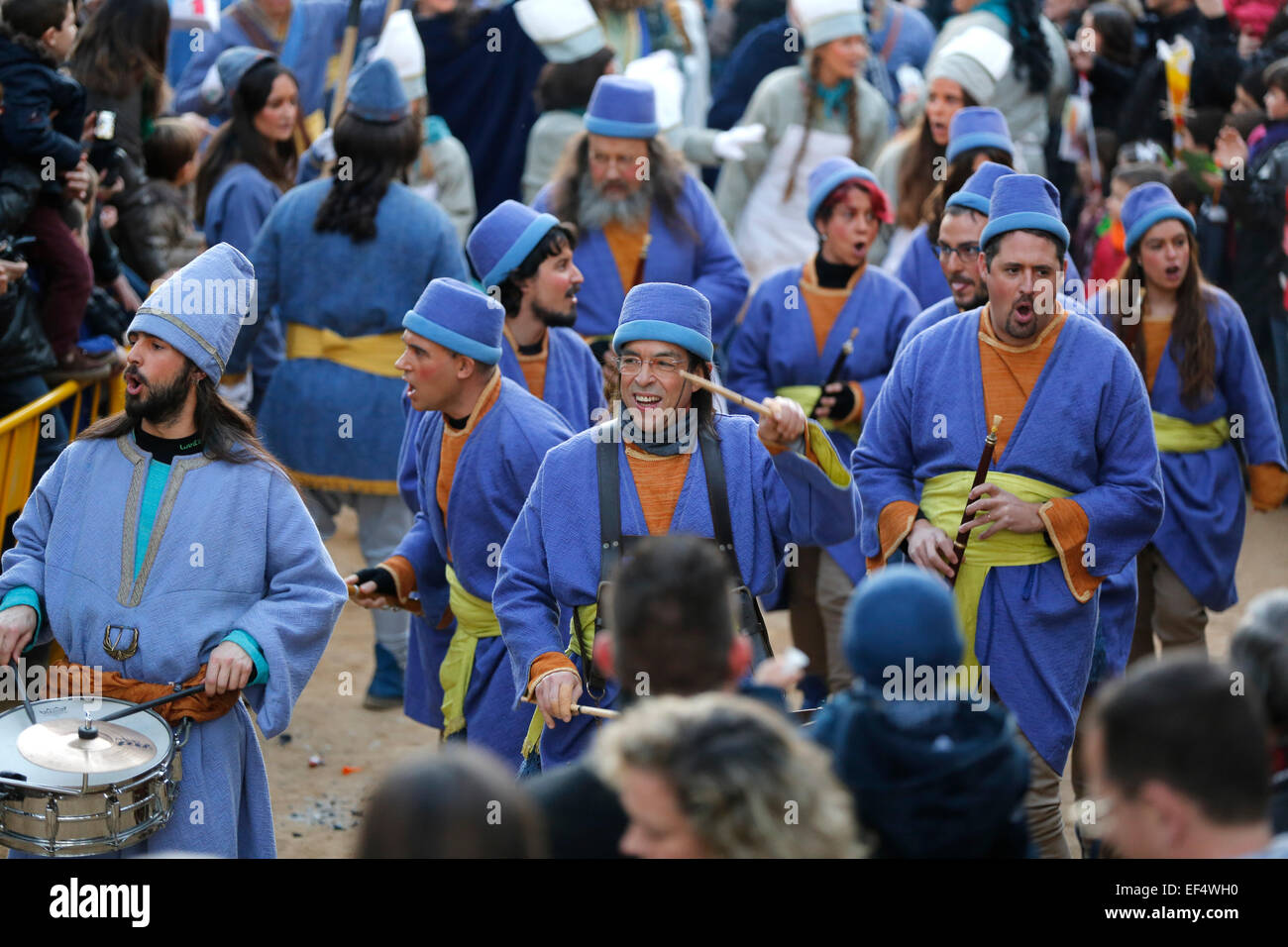 Participants in Epiphany Three Kings festival in Spain playing music ...