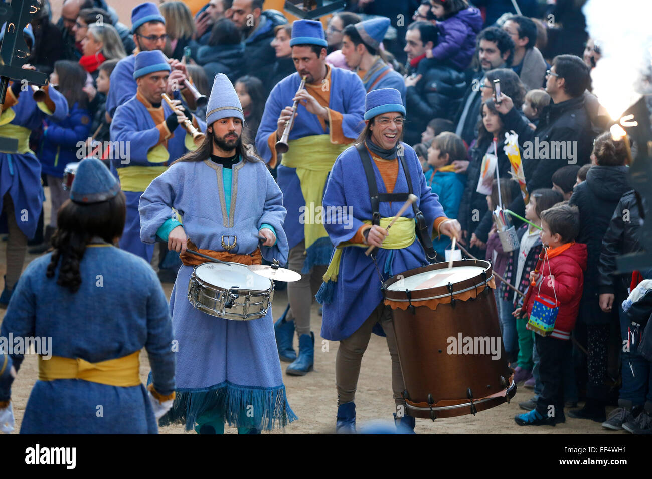 Participants in Epiphany Three Kings procession in Spain playing music ...