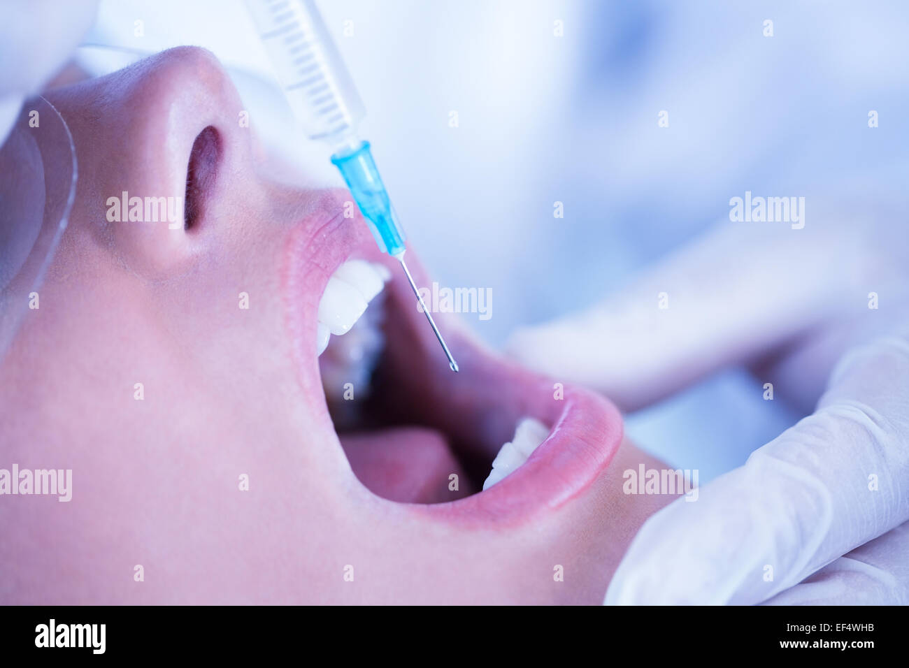 Close up of a patient with mouth open and syringe for injection Stock ...