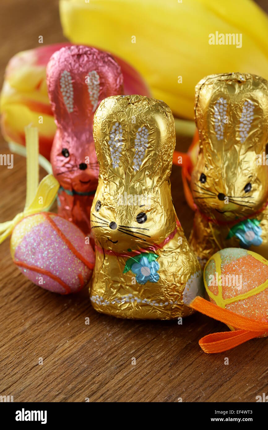 chocolate Easter bunny candy (sweets) with tulips Stock Photo - Alamy