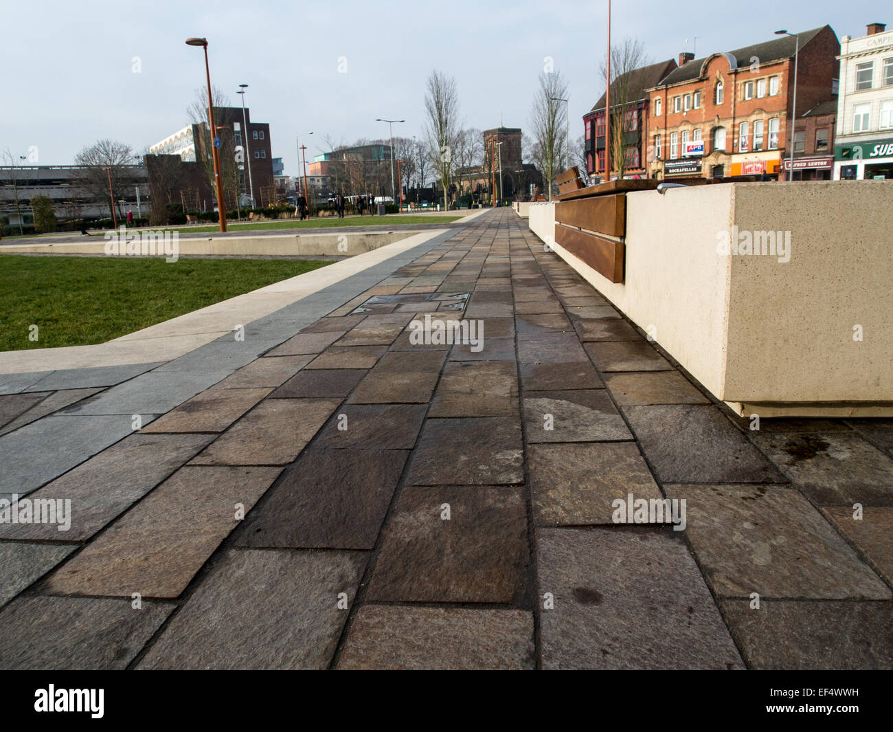 Street Furniture: Wood seating fixed onto concrete plinths in Jubilee ...