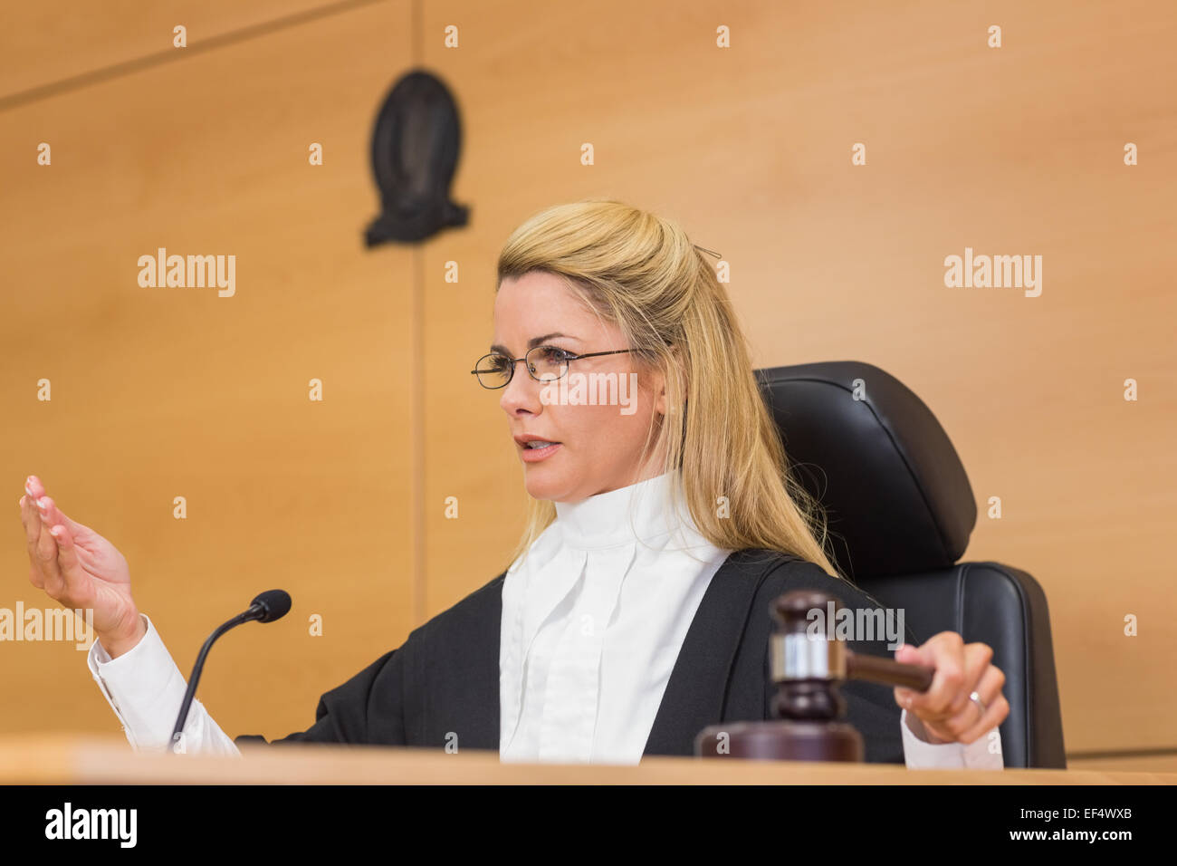 Stern judge speaking to the court Stock Photo - Alamy