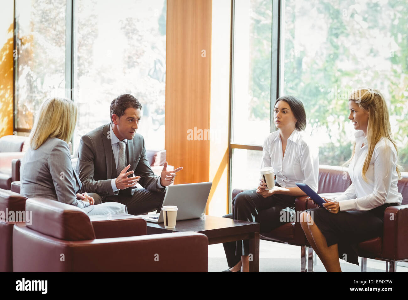 Business people working talking together hi-res stock photography and ...