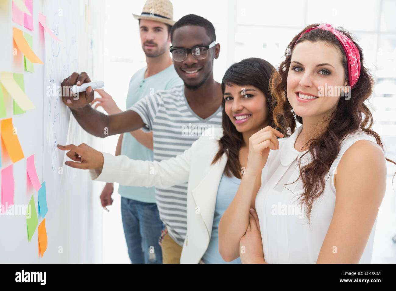 portrait of cheerful teamwork standing together Stock Photo - Alamy