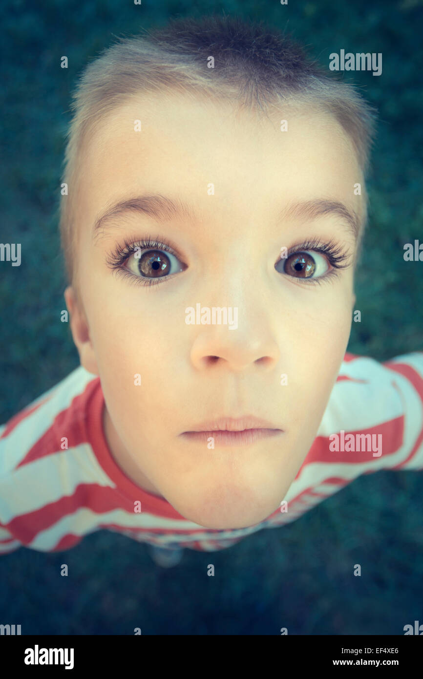Wide eyed boy hi-res stock photography and images - Alamy