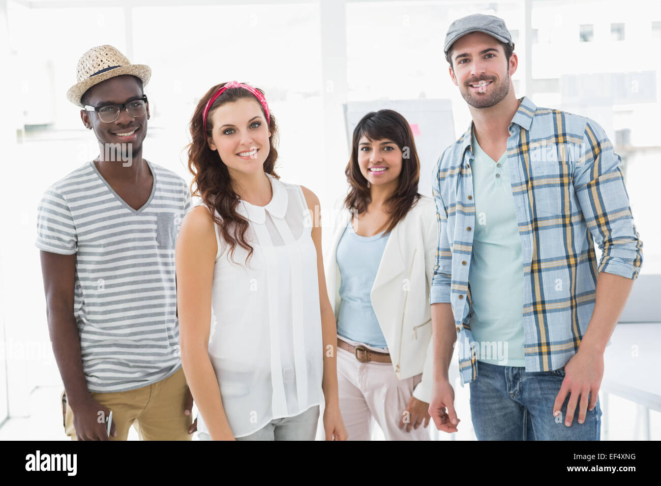 Smiling teamwork standing and smiling together Stock Photo - Alamy