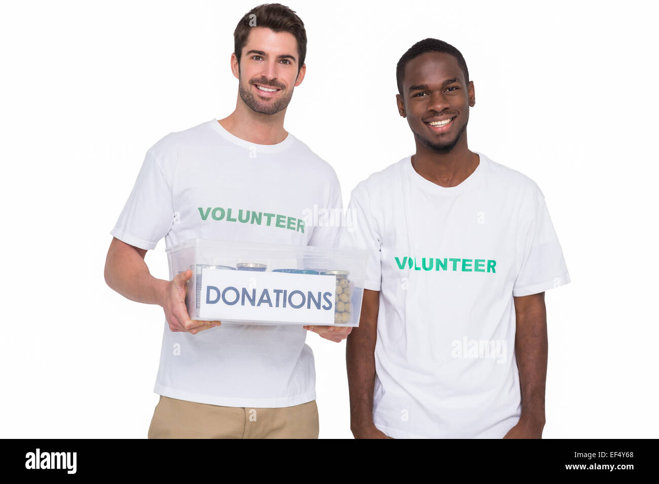 Portrait of smiling men participating at charity Stock Photo - Alamy