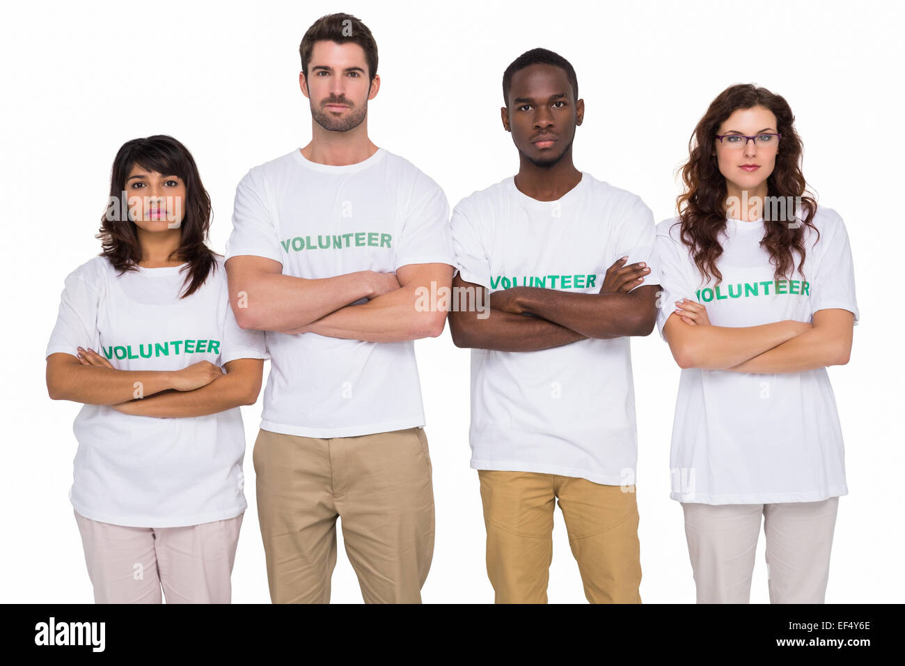 Serious teamwork standing with arms crossed Stock Photo - Alamy
