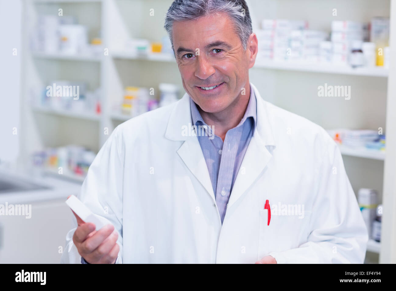 Pharmacist wearing lab coat hi-res stock photography and images - Alamy