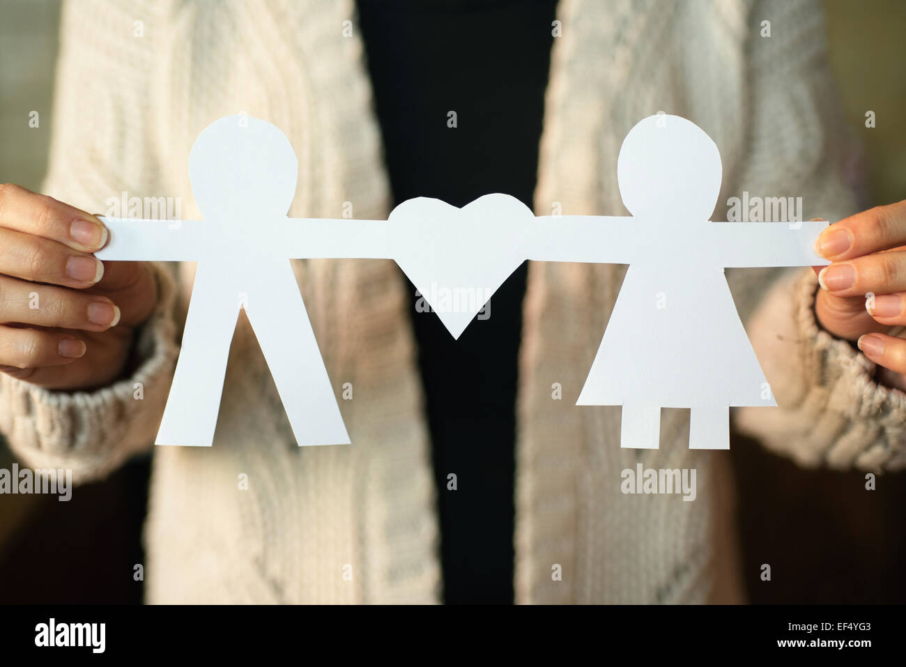 Two paper men with heart shape Stock Photo - Alamy