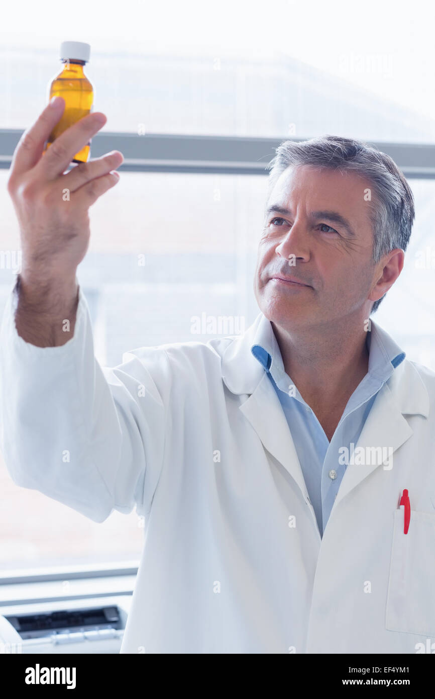 Scientist holding with jar hi-res stock photography and images - Alamy
