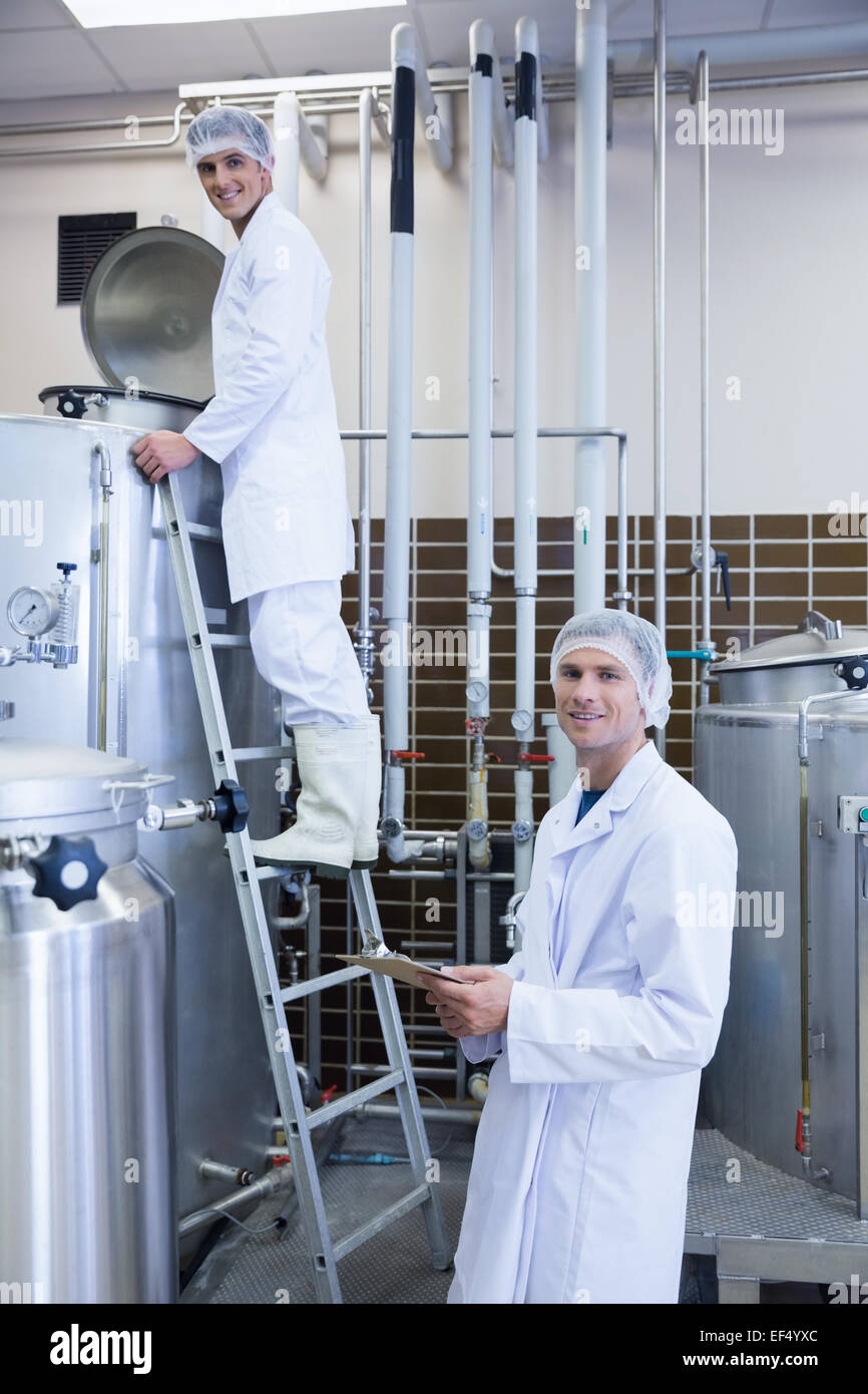 Men on ladder hi-res stock photography and images - Alamy