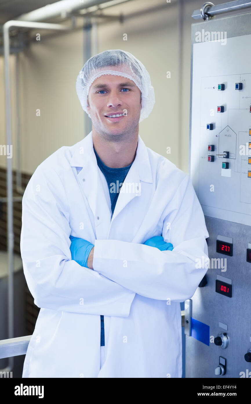 Portrait of a smiling scientist with arms crossed Stock Photo - Alamy
