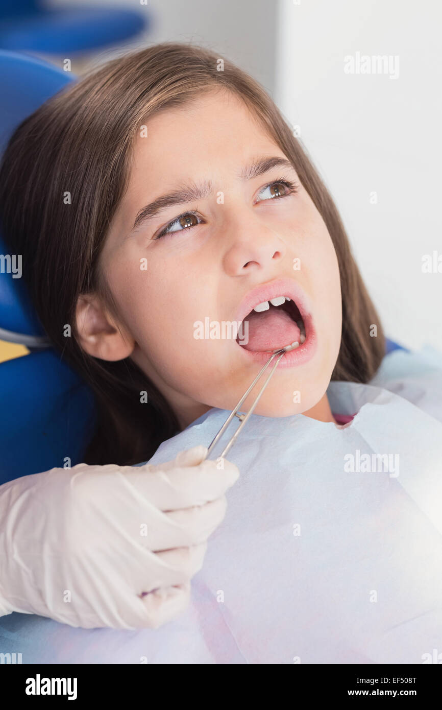 Portrait of a young patient in dental examination Stock Photo - Alamy