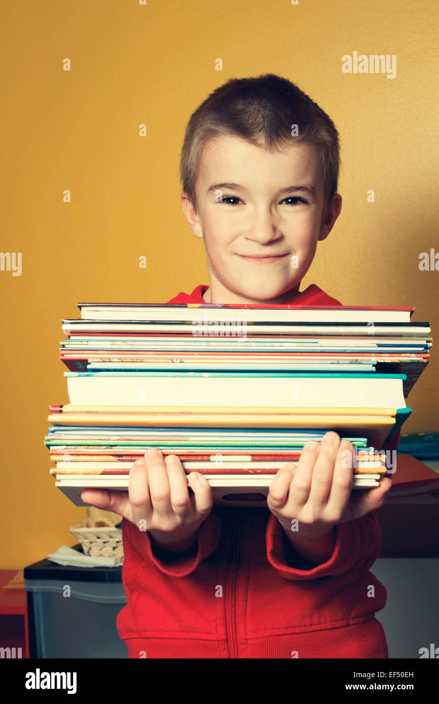 Kids Carrying Books Stock Photos & Kids Carrying Books Stock Images - Alamy