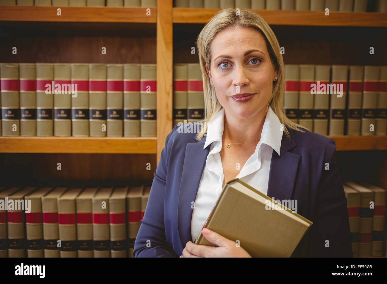 Posing with book hi-res stock photography and images - Alamy