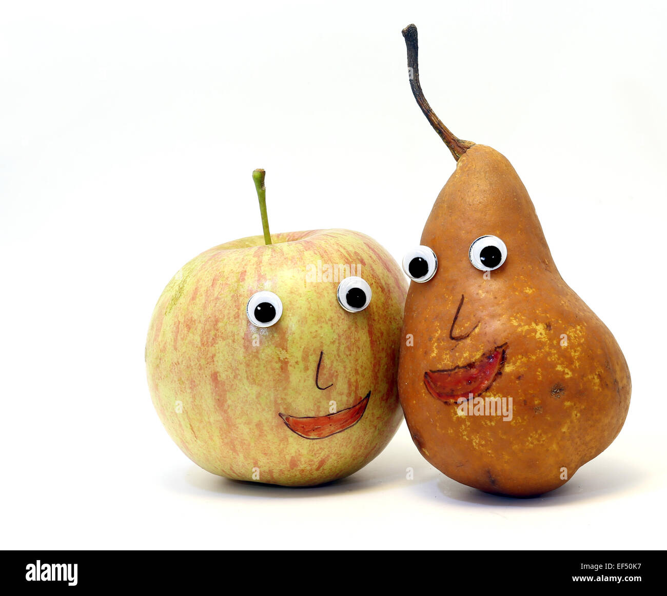 Nice pair of fruits: apple and PEAR with big eyes Stock Photo - Alamy