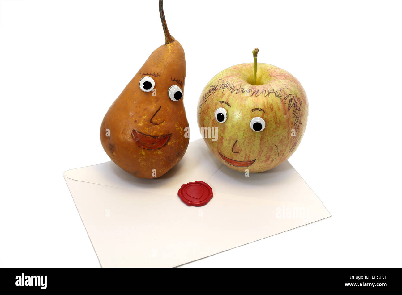 funny pair of fruits Apple and pear with eyes and the letter with the ...