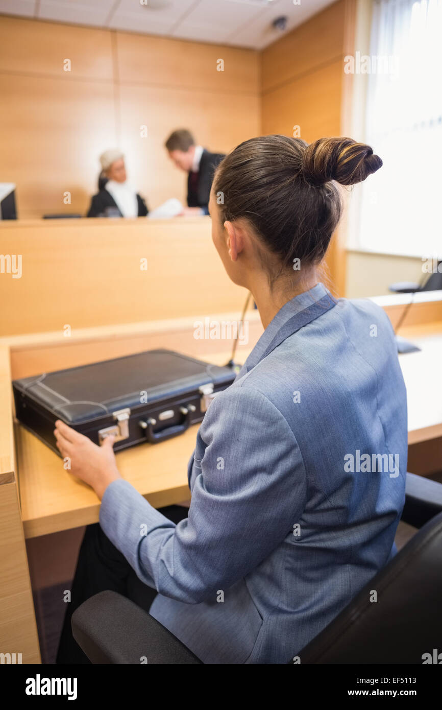 Lawyer listening to the judge Stock Photo - Alamy