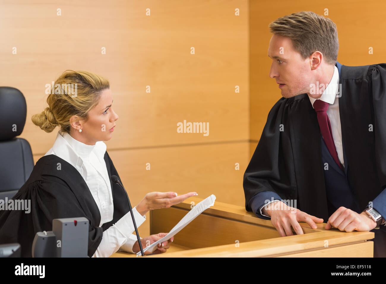 Lawyer speaking with the judge Stock Photo - Alamy