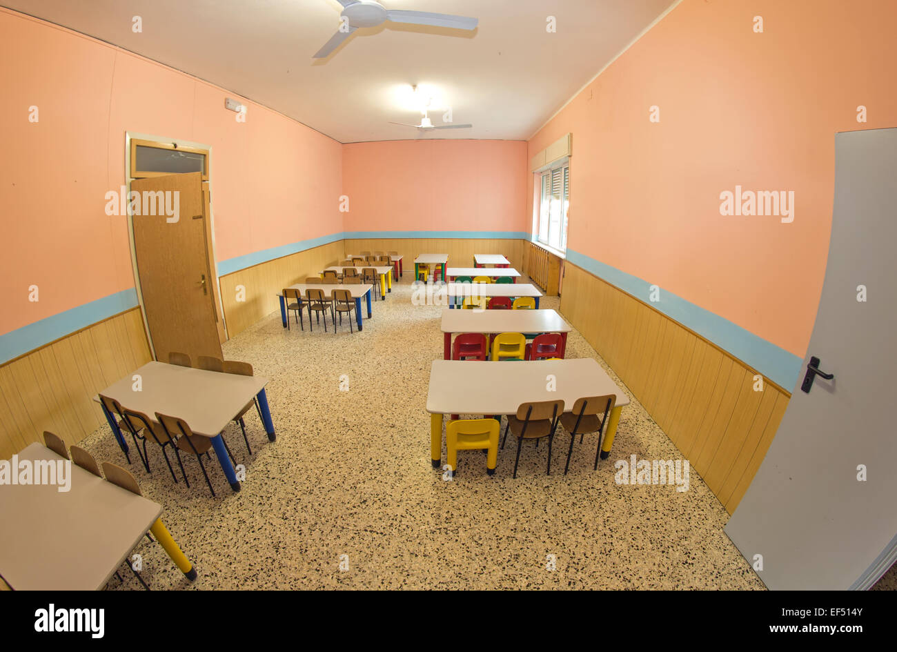 lunchroom of the refectory of the kindergarten with benches and chairs ...