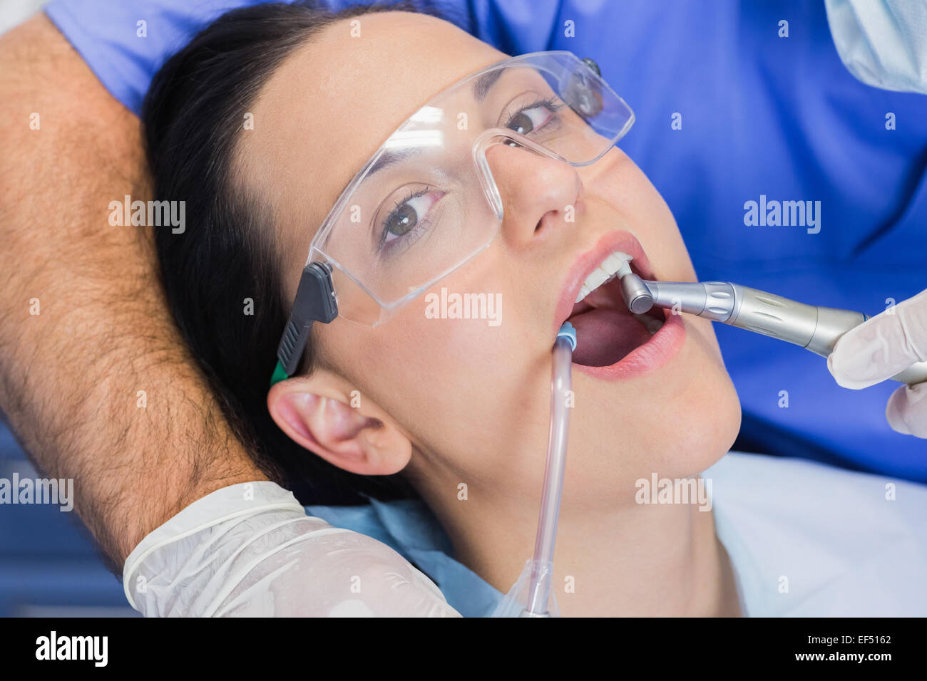 Portrait of a patient her mouth open Stock Photo - Alamy