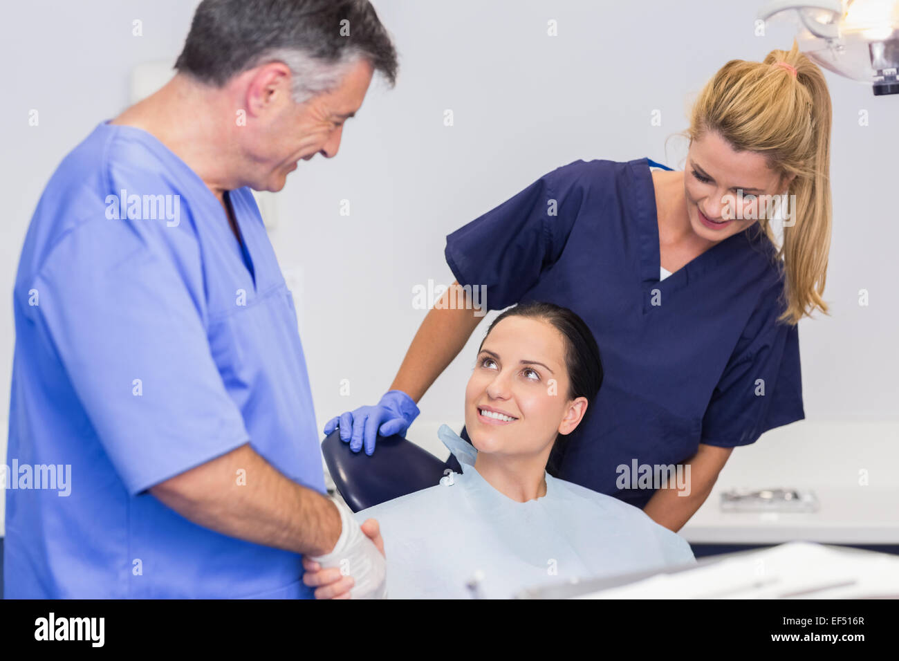 Female dentist greeting patient hi-res stock photography and images - Alamy