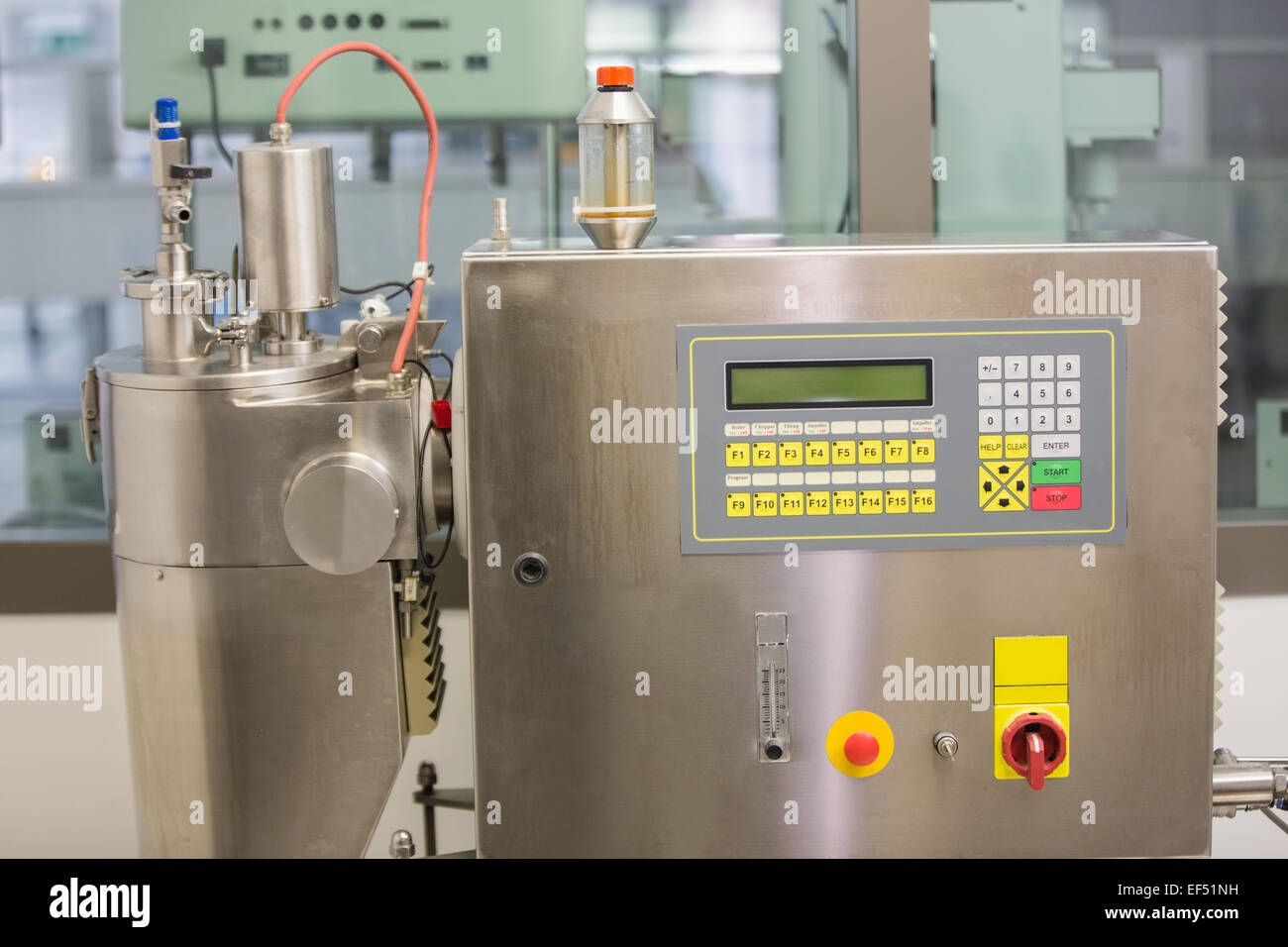 Machine used in medicine making Stock Photo - Alamy