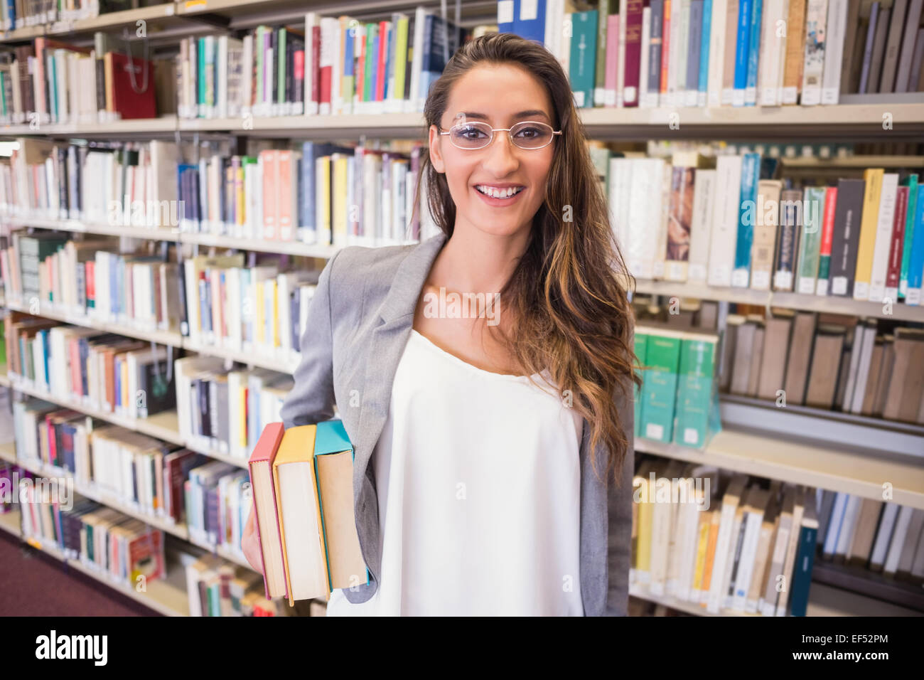 Holding text books hi-res stock photography and images - Alamy