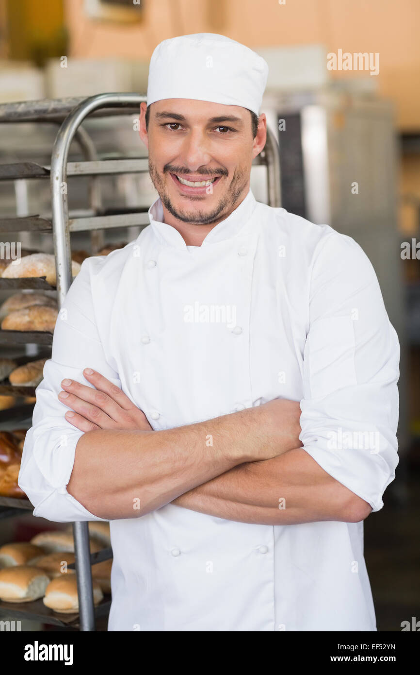 Smiling baker looking at camera Stock Photo - Alamy