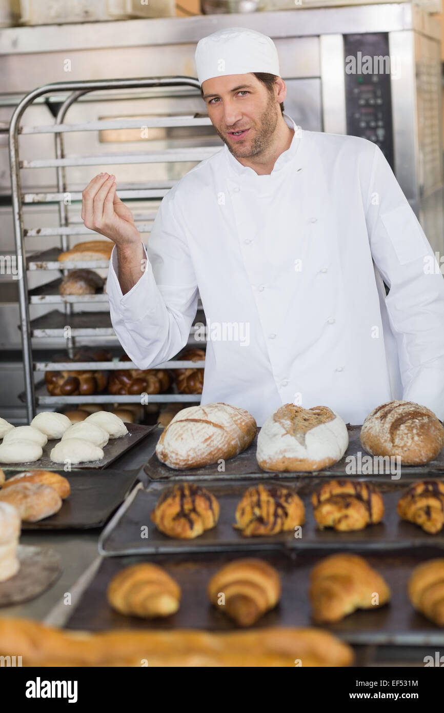 Smiling baker looking at camera Stock Photo - Alamy