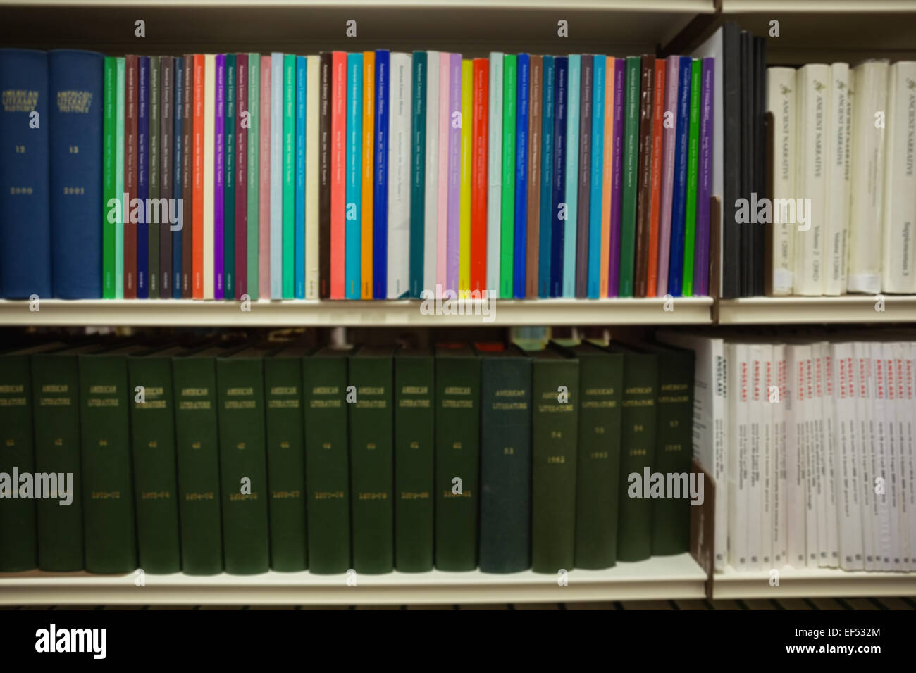 Volumes of books on bookshelf in library Stock Photo - Alamy