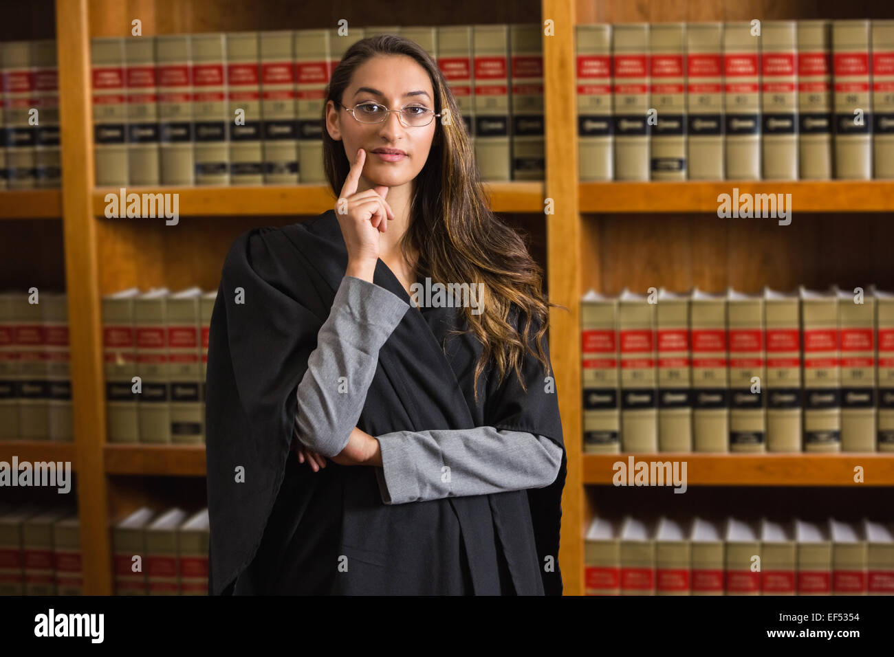Pretty lawyer thinking in law hi-res stock photography and images - Alamy