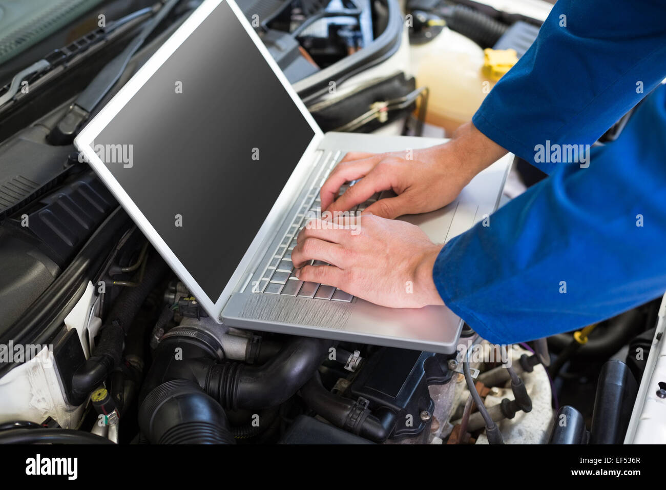Laptop on hood of car hi-res stock photography and images - Alamy
