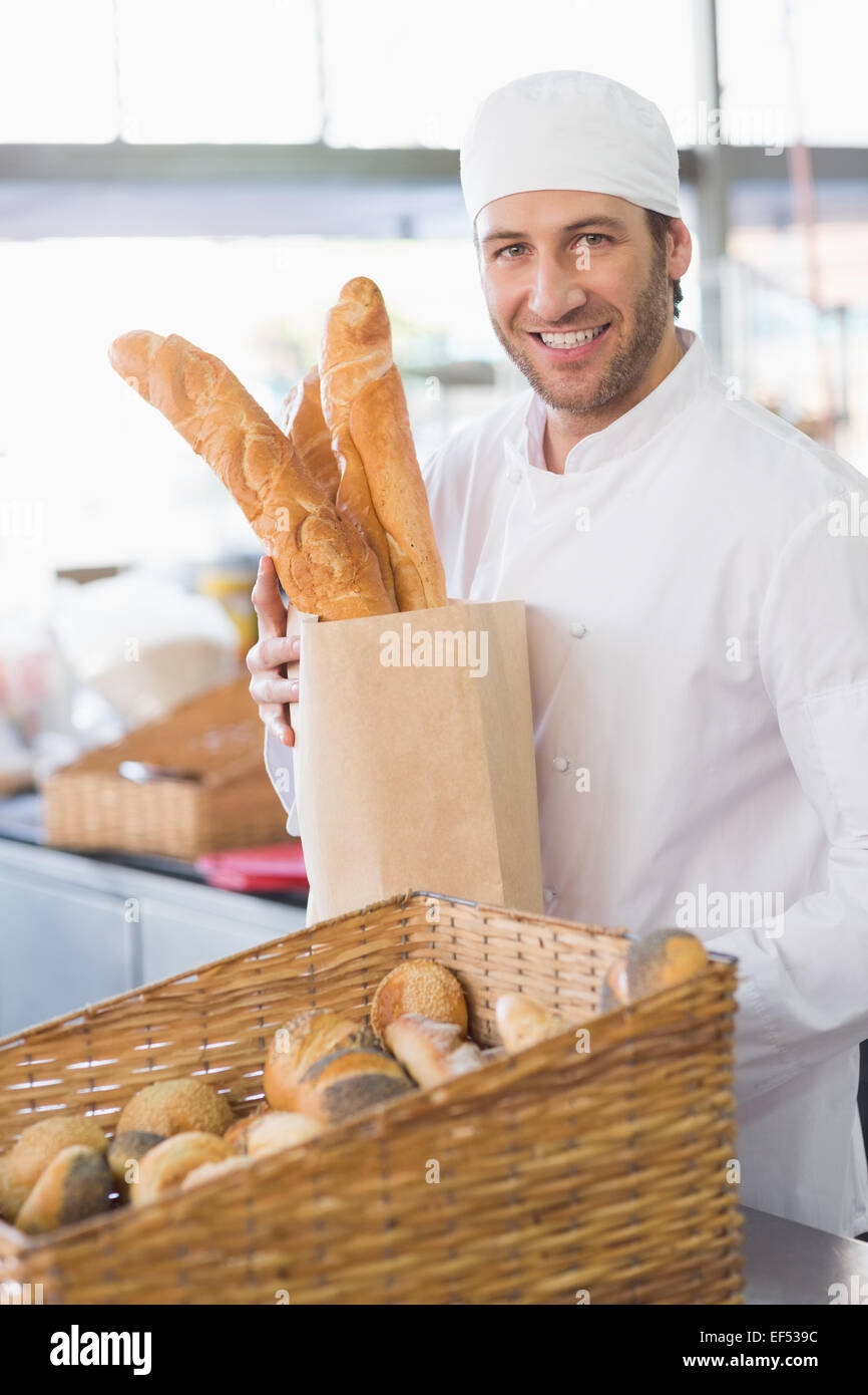 Adult man baker basket hi-res stock photography and images - Alamy
