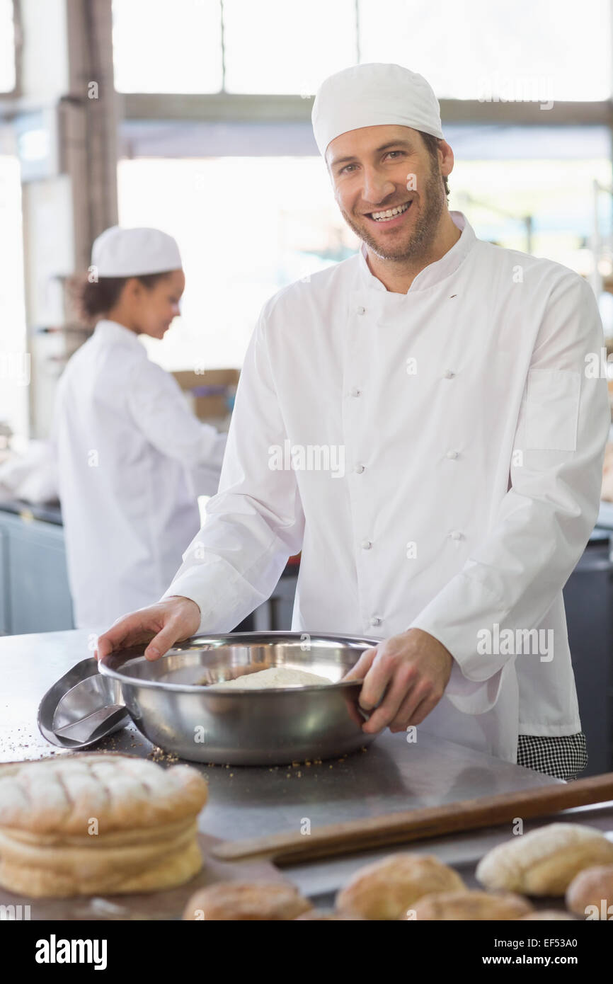Smiling baker looking at camera Stock Photo - Alamy