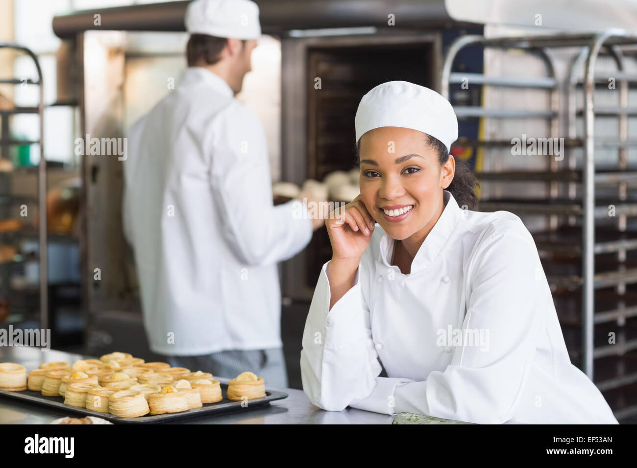Baker smiling at the camera Stock Photo - Alamy